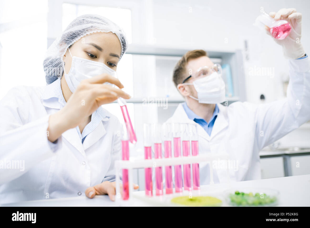 Microbiologists testing meat samples in liquid form Stock Photo - Alamy