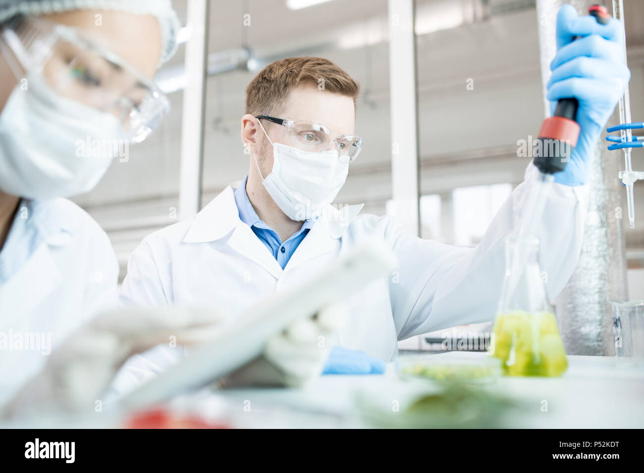 Sample taking hi-res stock photography and images - Alamy