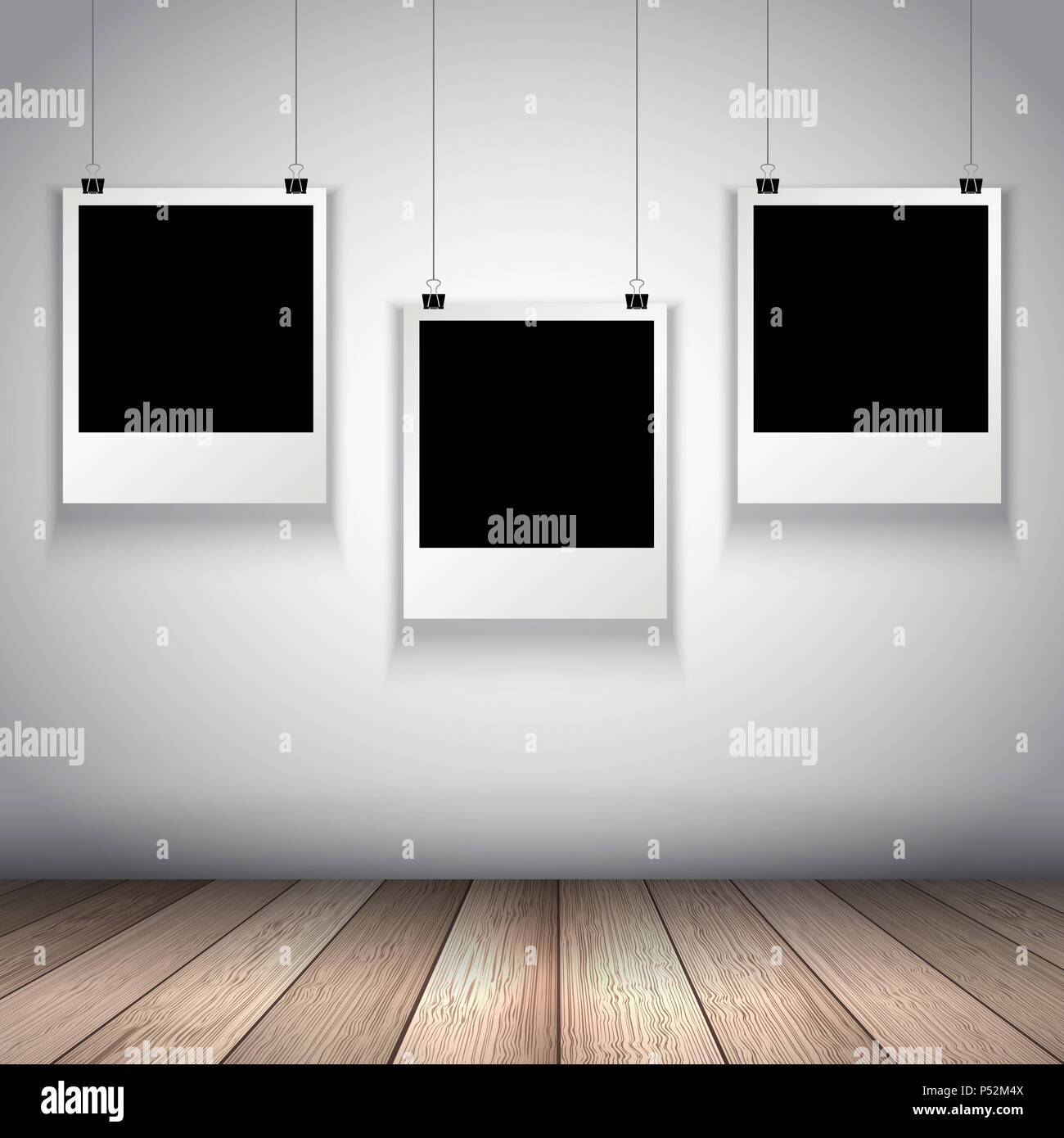 Collection of hanging blank photos Stock Photo - Alamy
