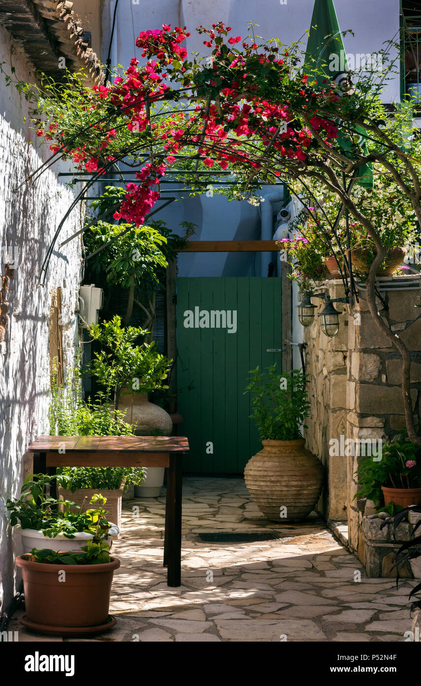 A back gate in Lakka, Paxos Stock Photo - Alamy