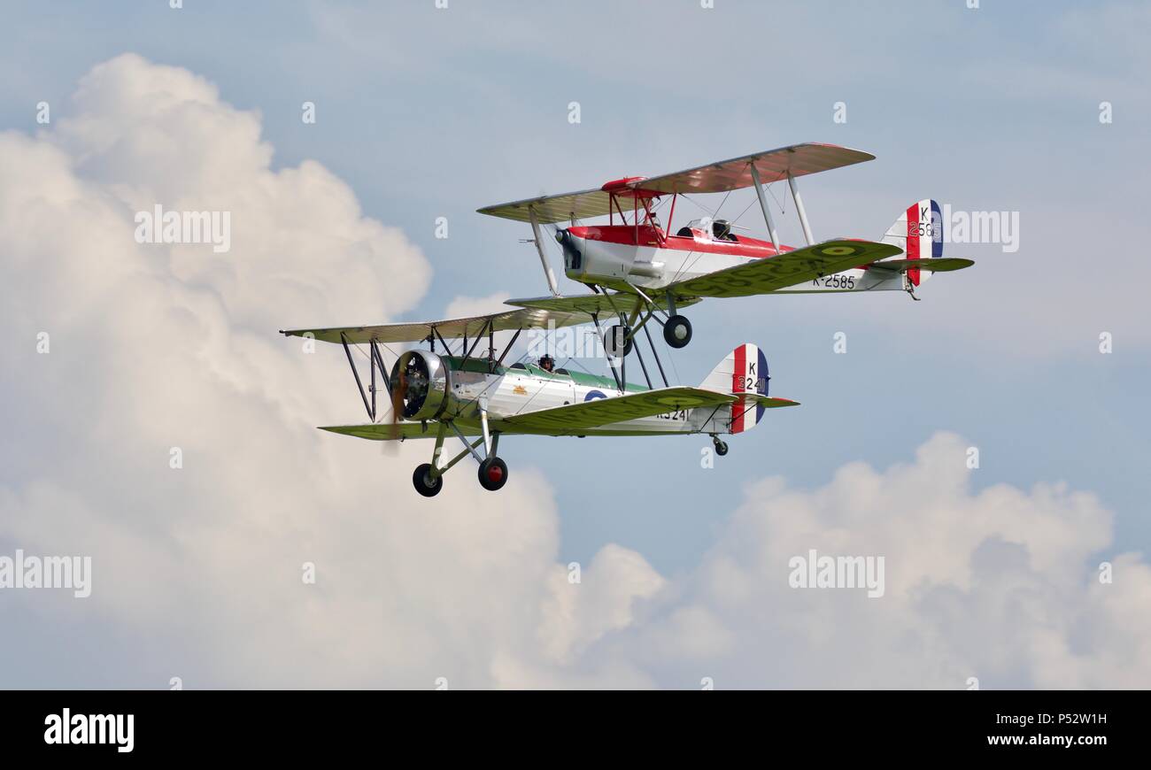 1931 Avro 621 Tutor (K3241) and a 1931 DH82a Tiger Moth flying together ...