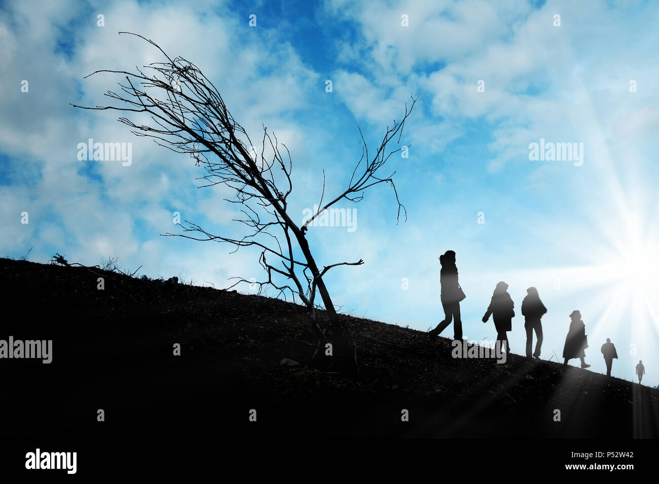 an image of people walking and blue sky Stock Photo - Alamy