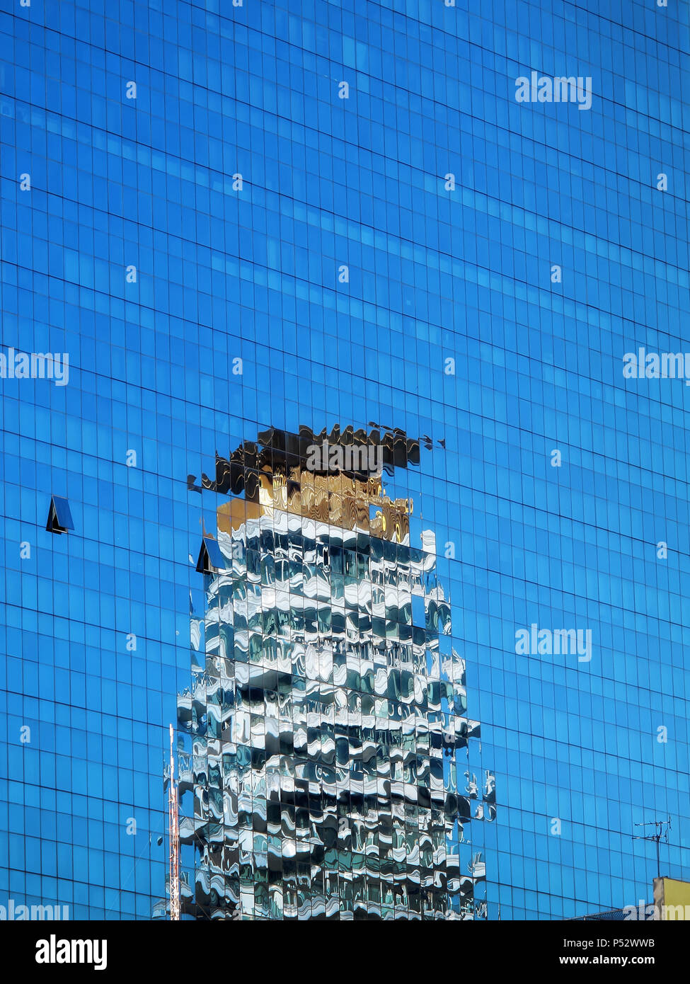 close up architectural detail from tall glass building in Thailand ...