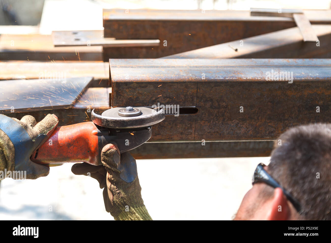 Cutting steel heavy industry by electric flex Stock Photo - Alamy