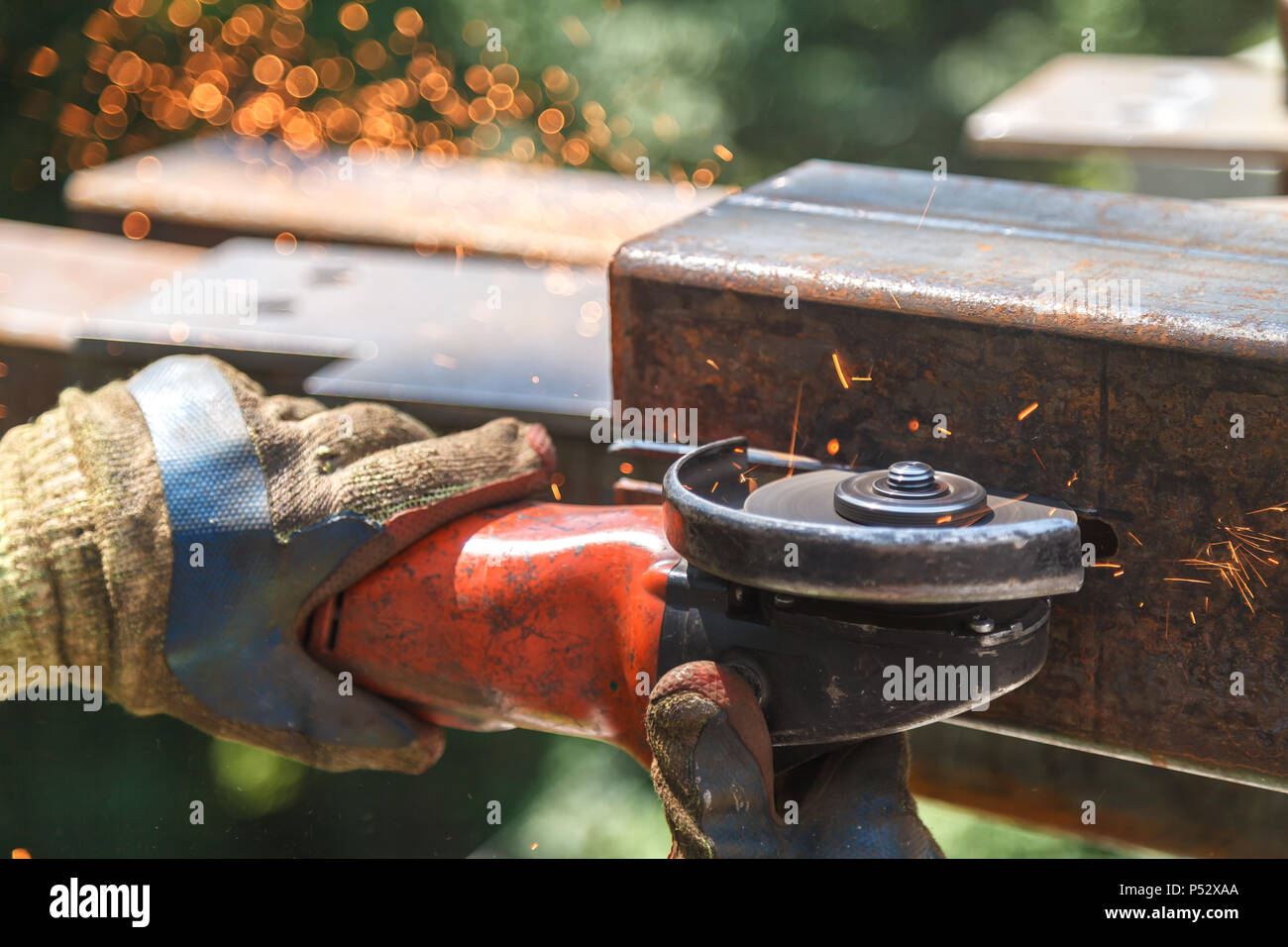 Cutting steel heavy industry by electric flex Stock Photo - Alamy