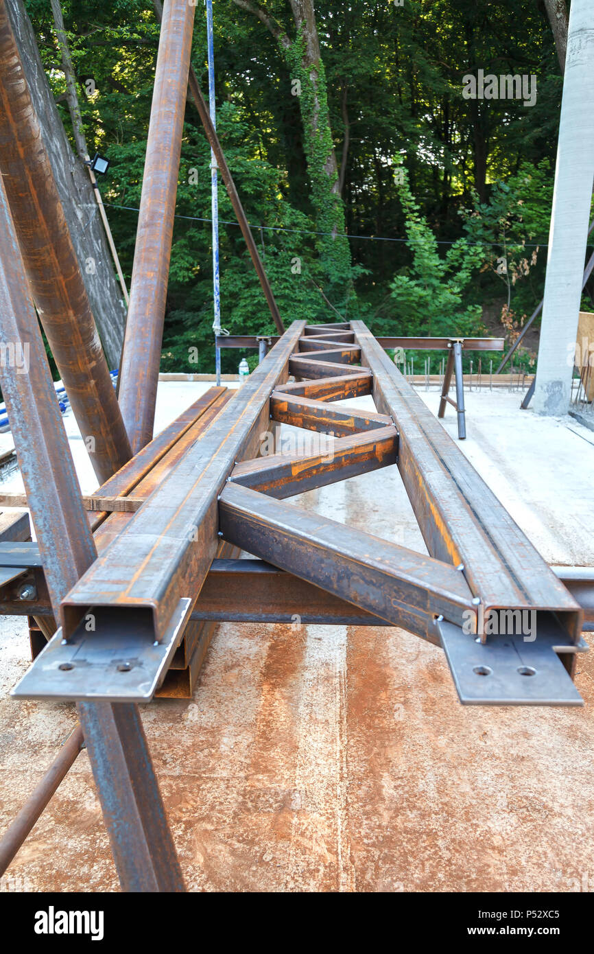 Manufacturing of a truss made of metal pipes to strengthen building ...