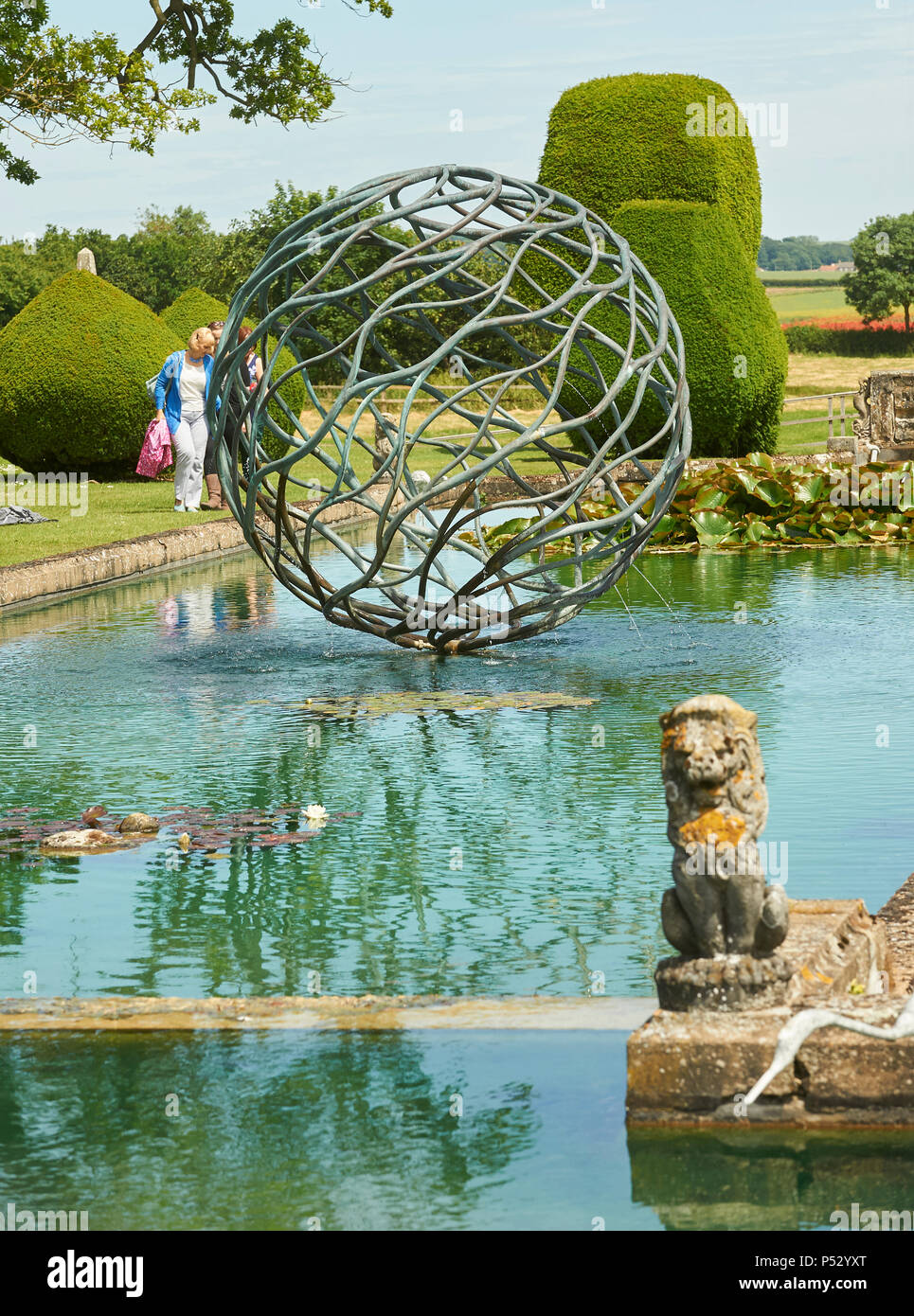 Revolving water feature with small jets of water coming from the whole ...