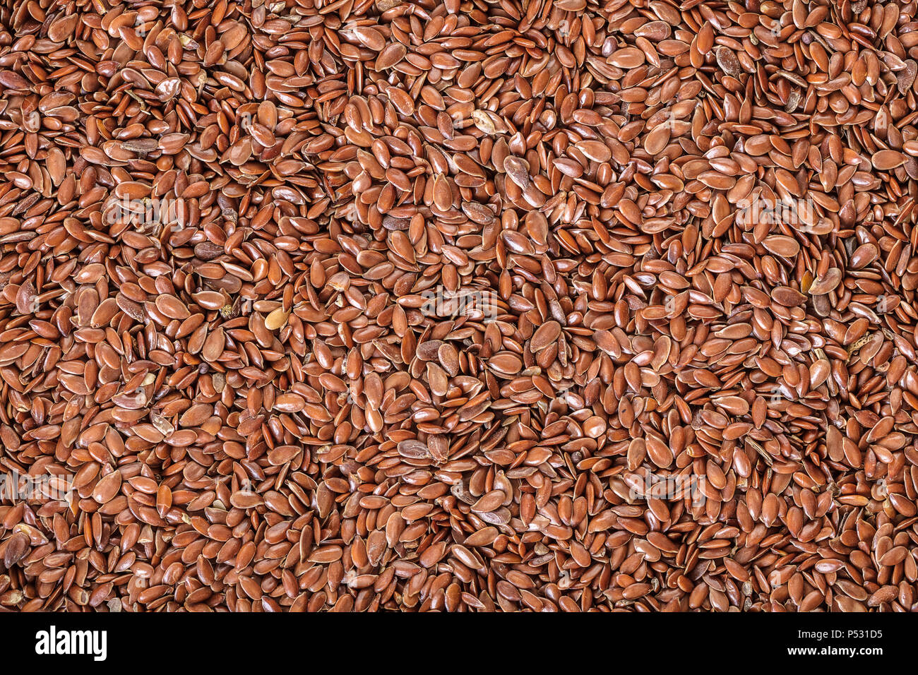 food background of a flax seed texture closeup Stock Photo - Alamy