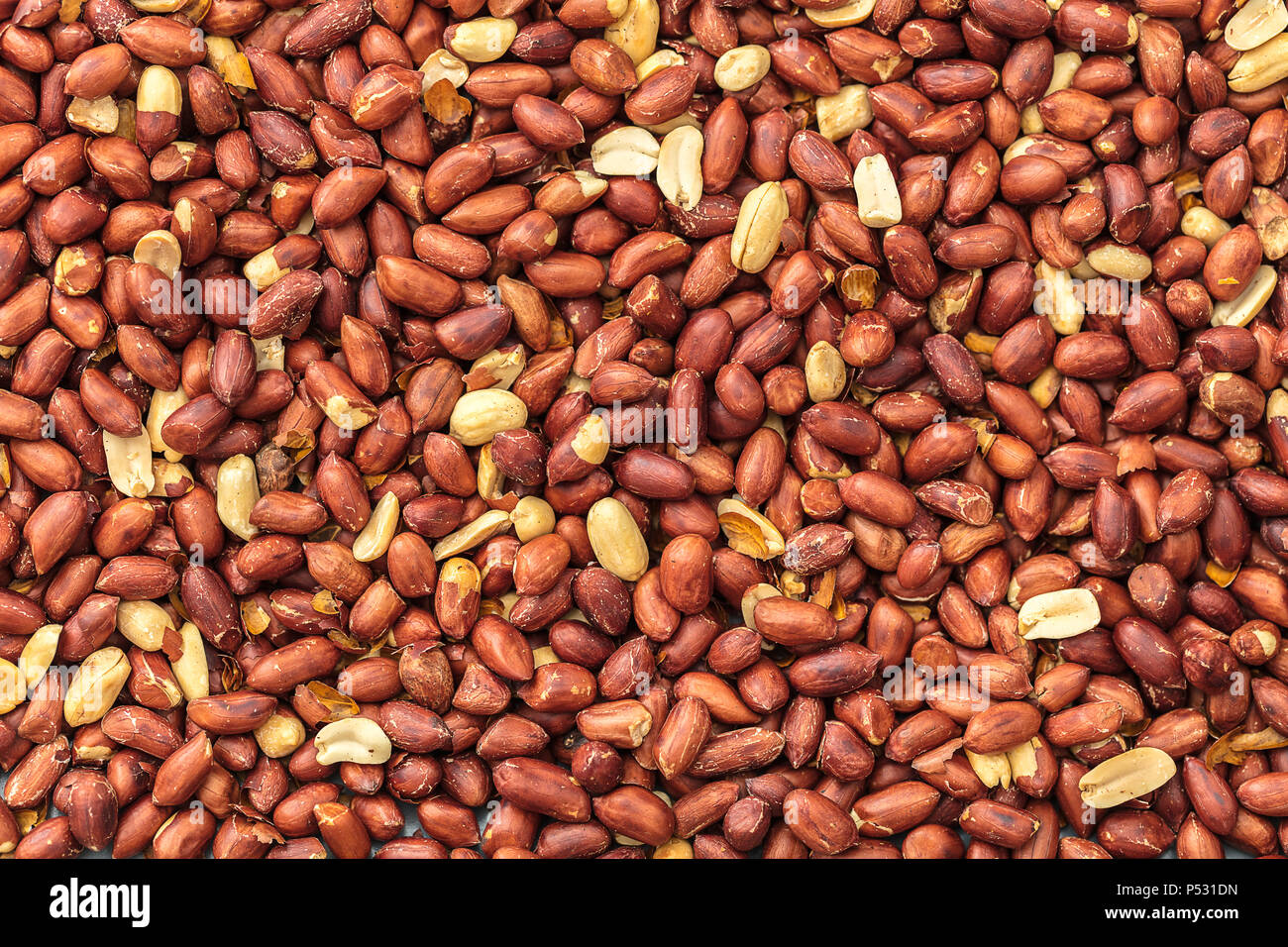 food background of a texture of roasted peanuts close-up Stock Photo ...