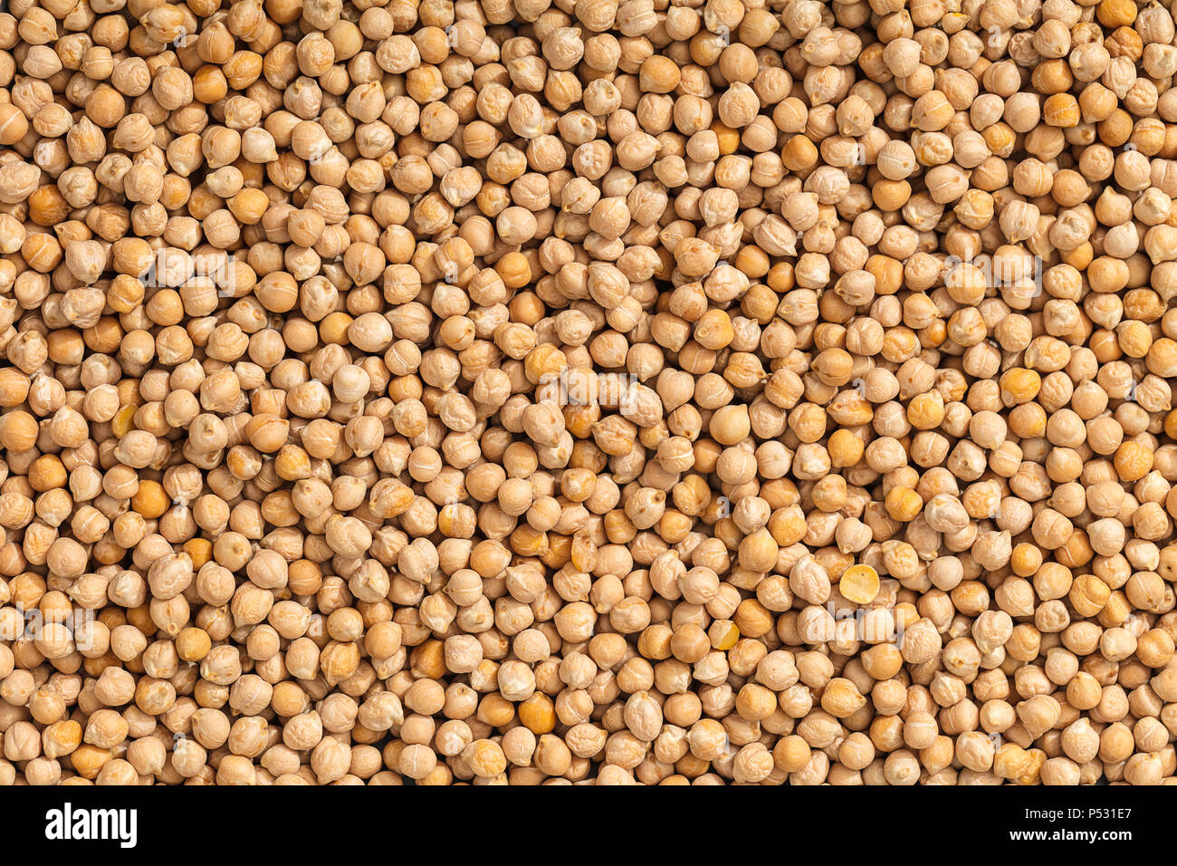 food background from a texture of raw chickpeas close-up Stock Photo ...