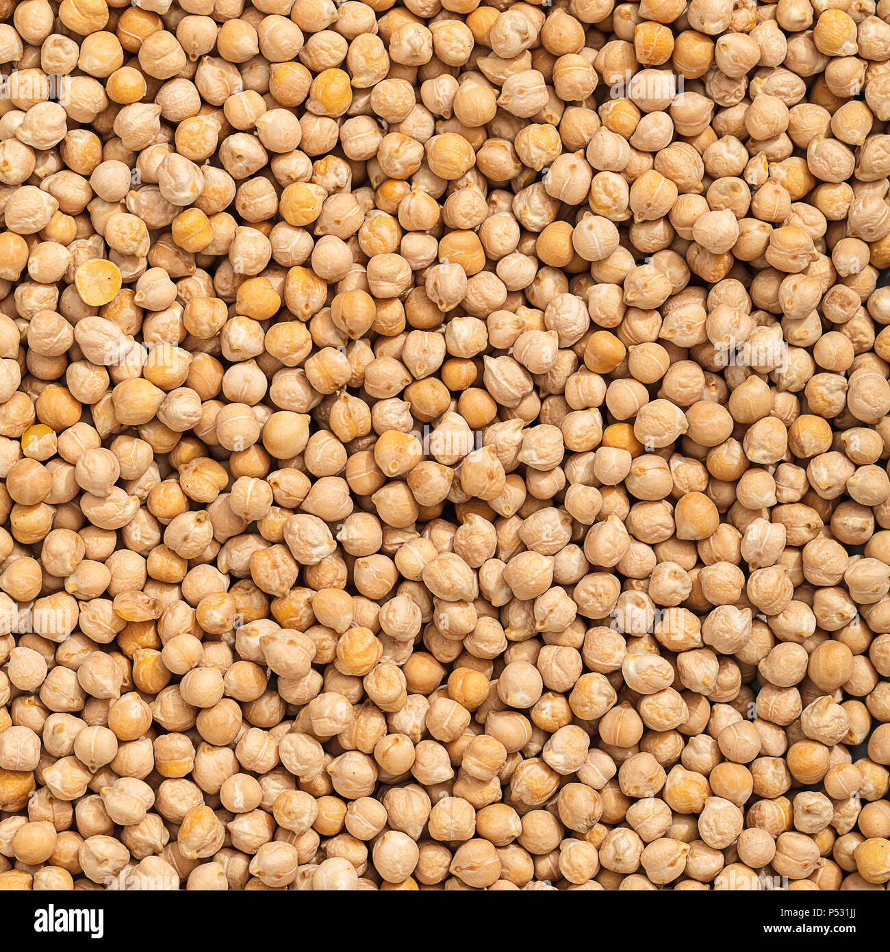food background from a texture of raw chickpeas close-up Stock Photo ...