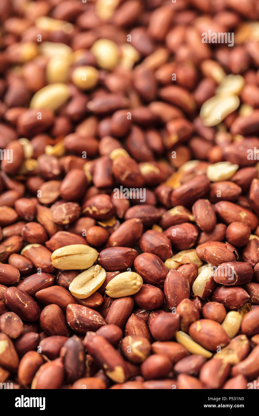 food background of a texture of roasted peanuts close-up Stock Photo ...