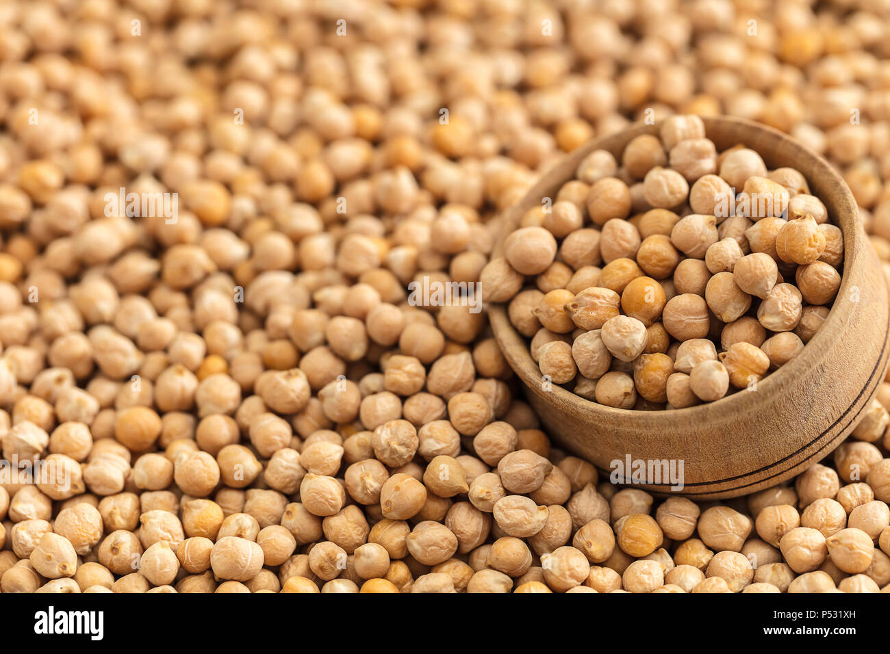 food background from a texture of raw chickpeas close-up Stock Photo ...