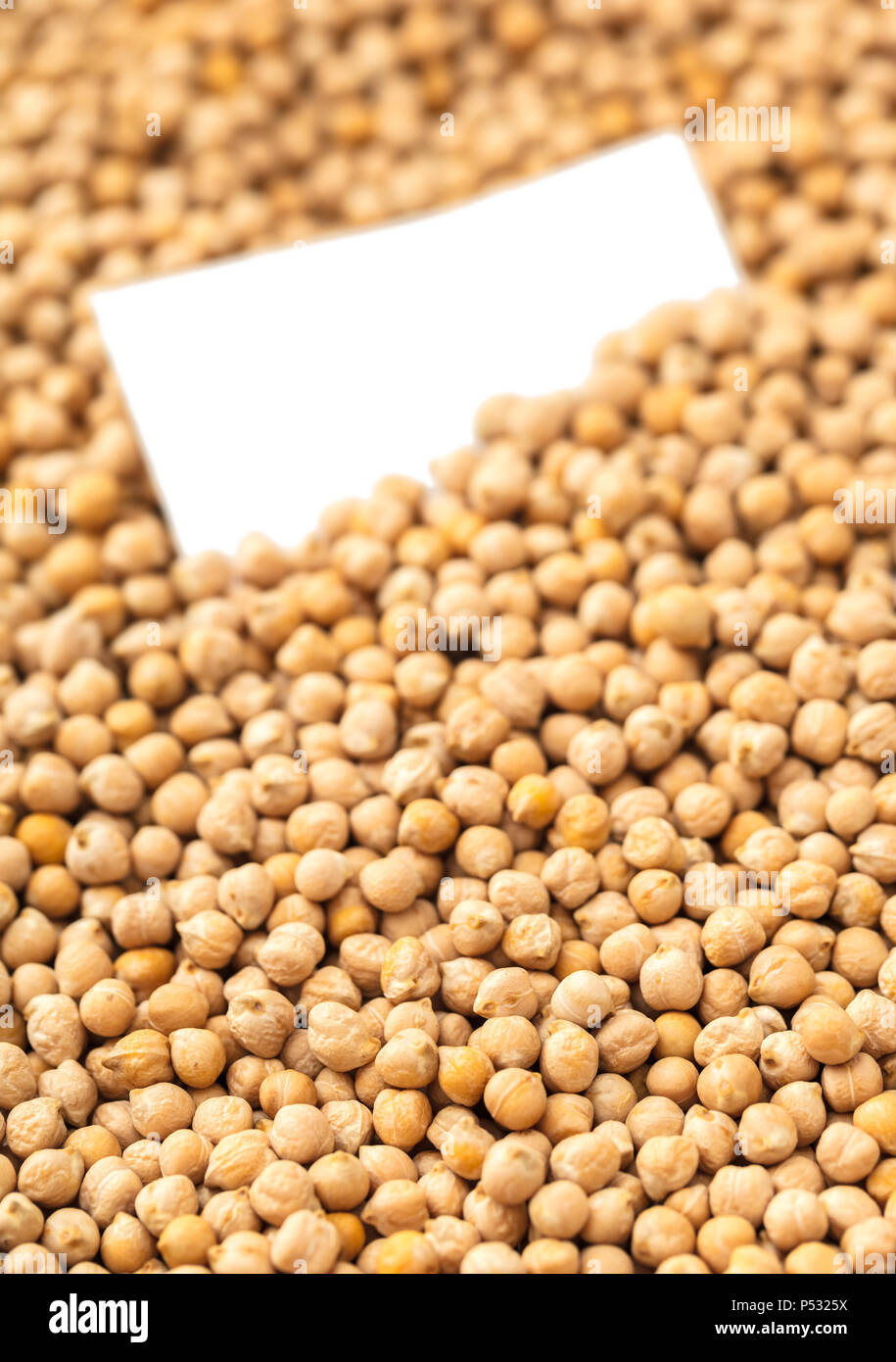 food background from a texture of raw chickpeas close-up Stock Photo ...