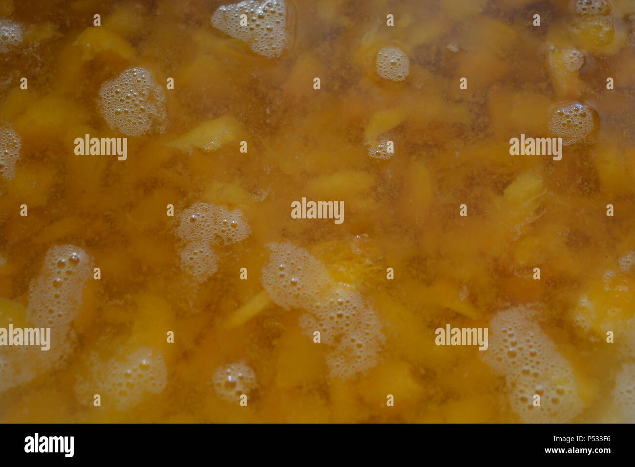 Food, cooking homemade meals, boiled peach slices, peach compote ...
