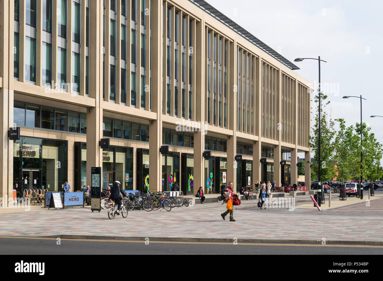 Station Square by Cambridge train station with people and buildings in ...