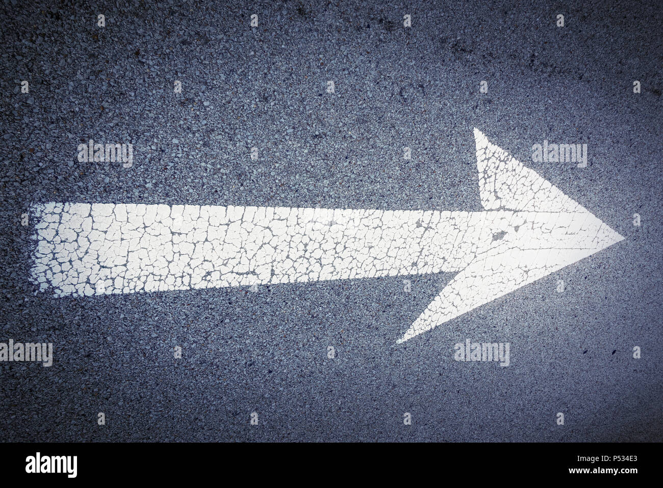 an image of an arrow sign on the road Stock Photo - Alamy