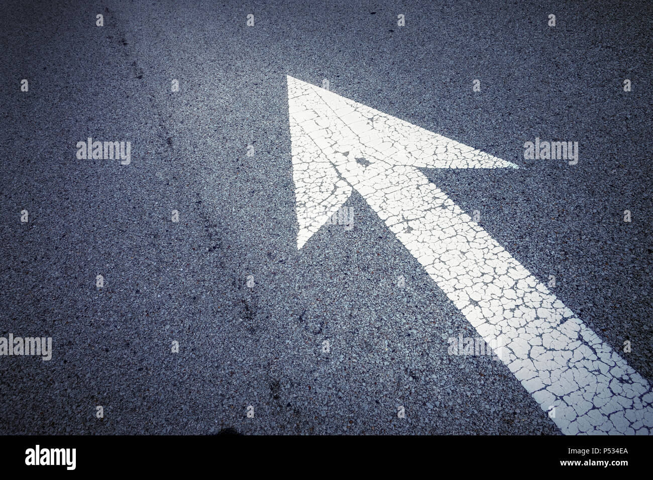 an image of an arrow sign on the road Stock Photo - Alamy