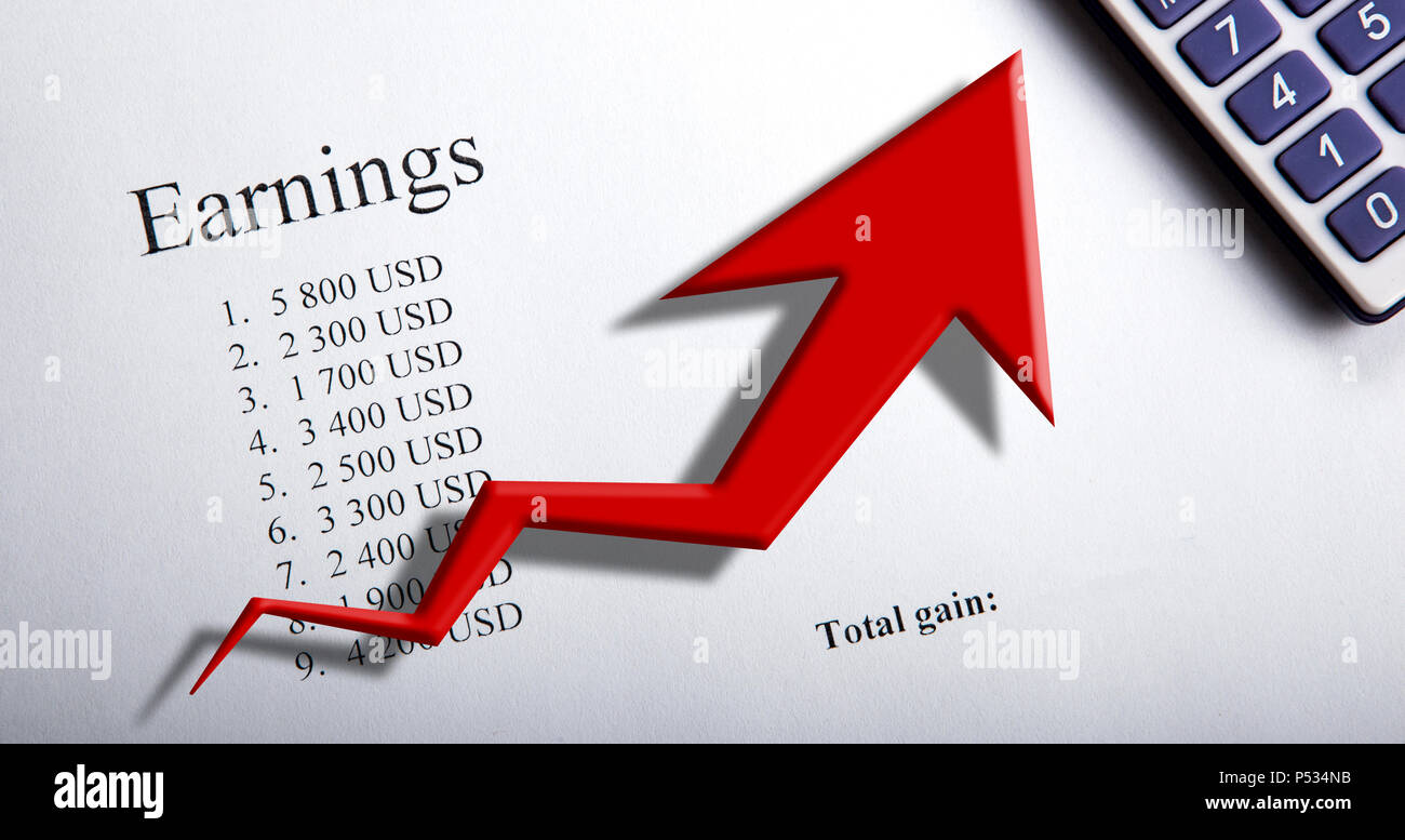 table with earnings with digits, calculator and diagram close up Stock ...