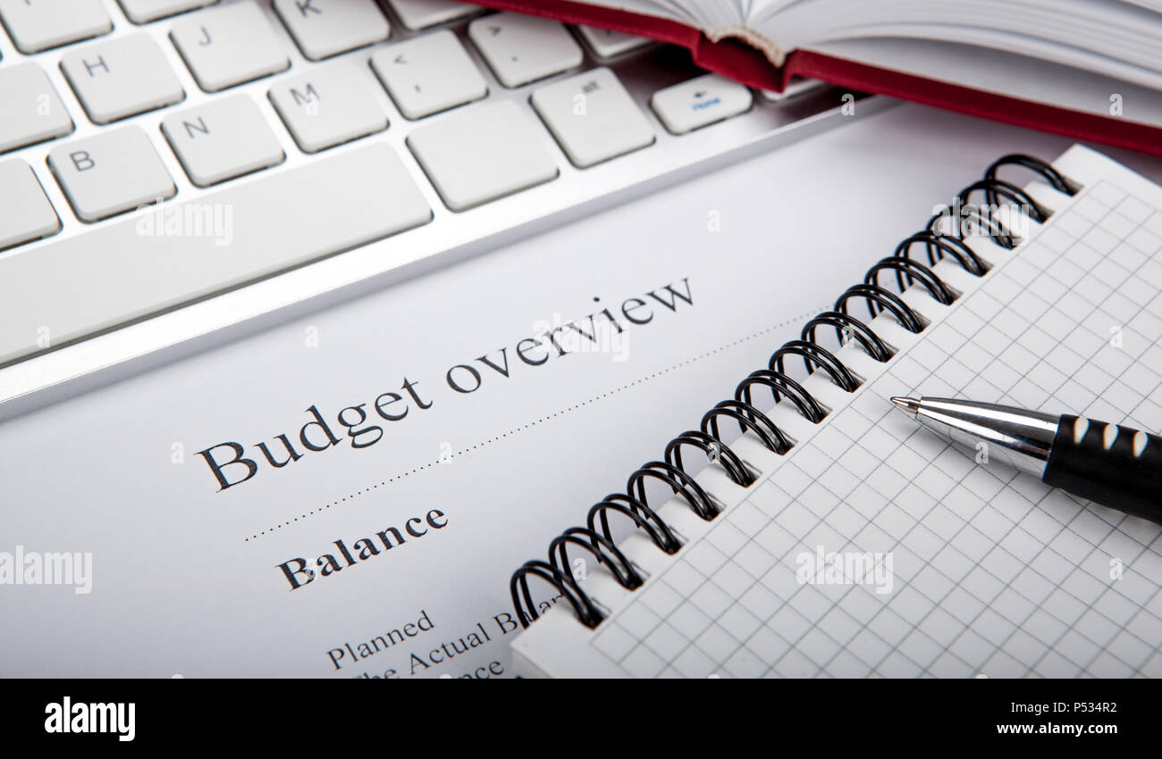 document with title budget overview and office tools close up Stock ...
