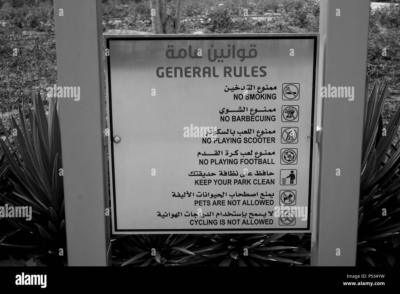 List of Park rules and regulations in English and Arabic displayed in a ...