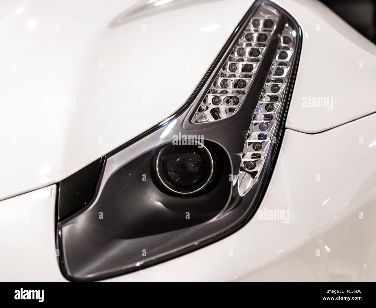 The headlight of a modern Ferrari FF super car Stock Photo - Alamy