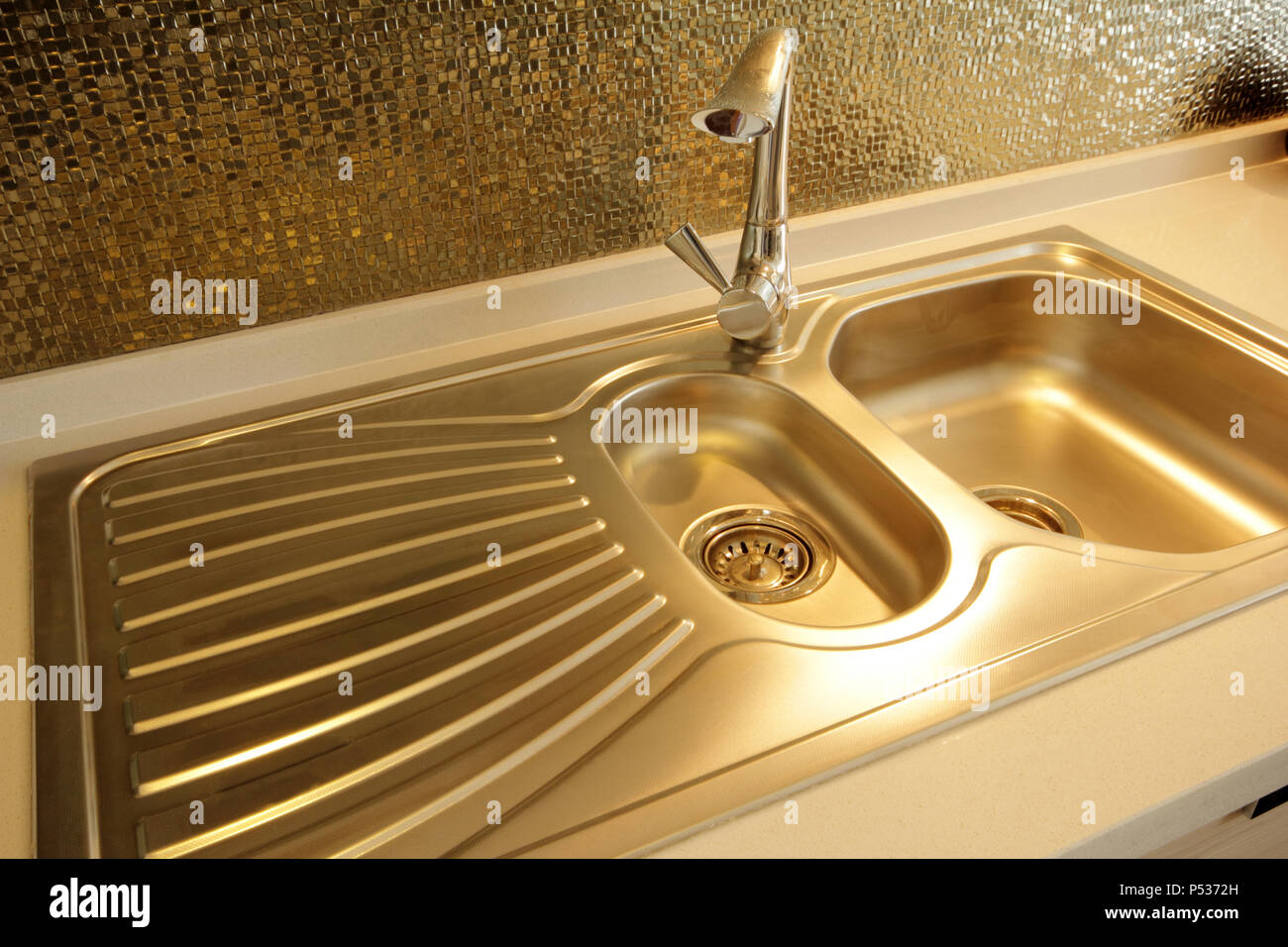 Clean chrome tap and washbasin Stock Photo - Alamy