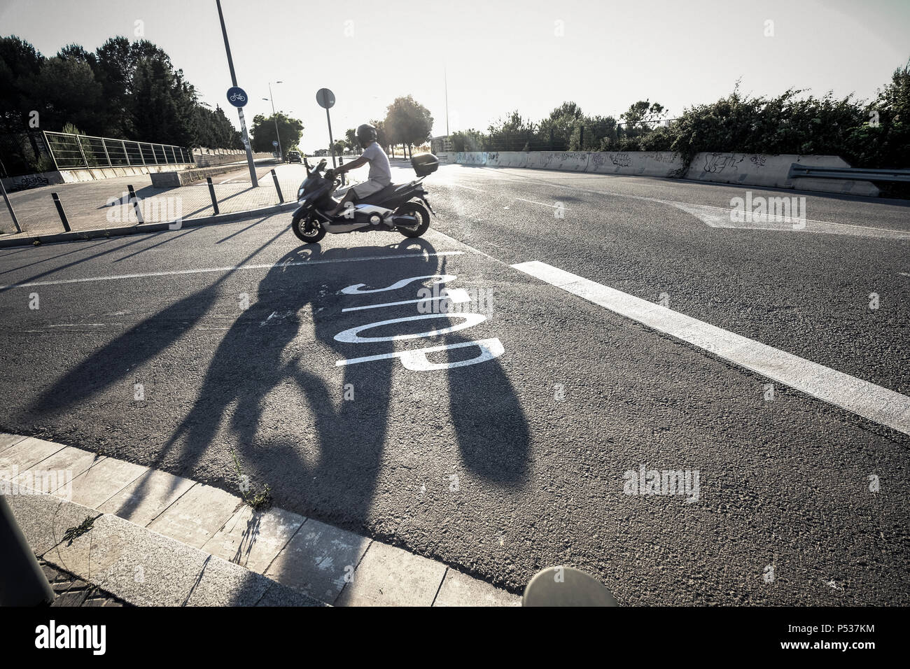 Traffic sign on a street without cars Stock Photo - Alamy