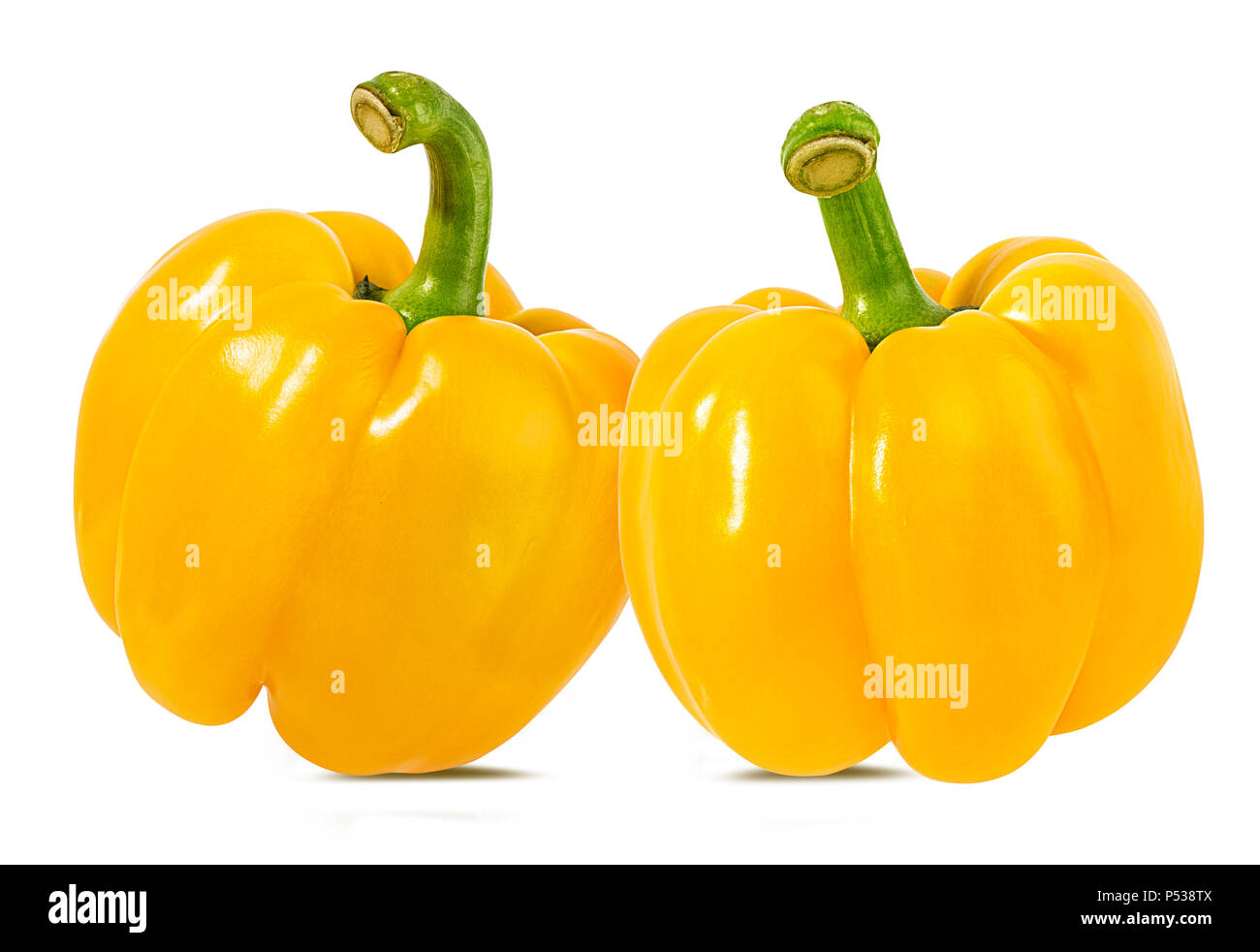 Yellow peppers isolated. With clipping path Stock Photo - Alamy