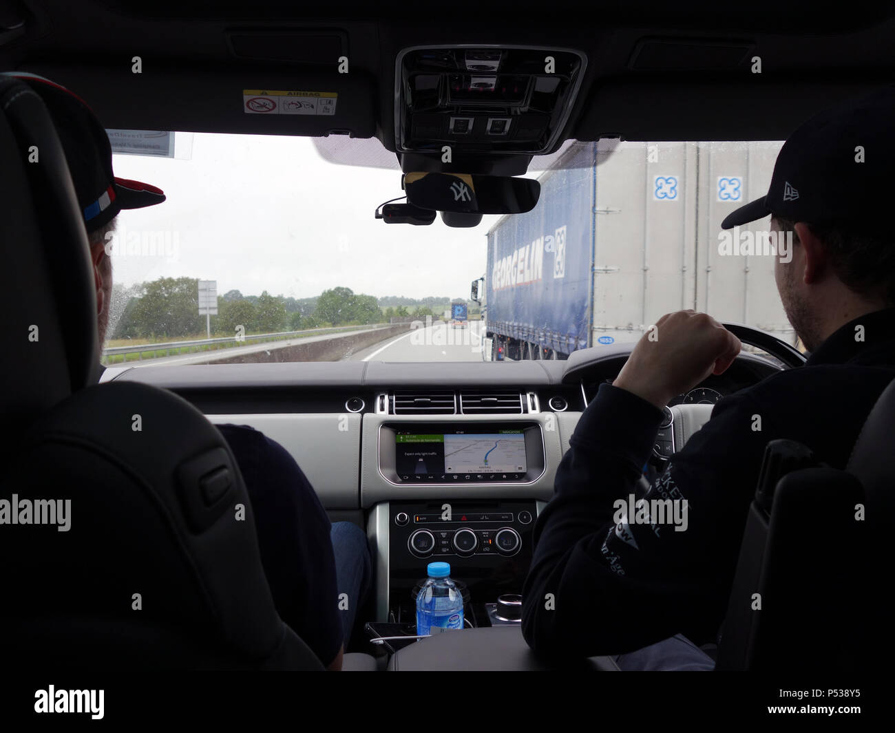 Two guys in car hi-res stock photography and images - Alamy