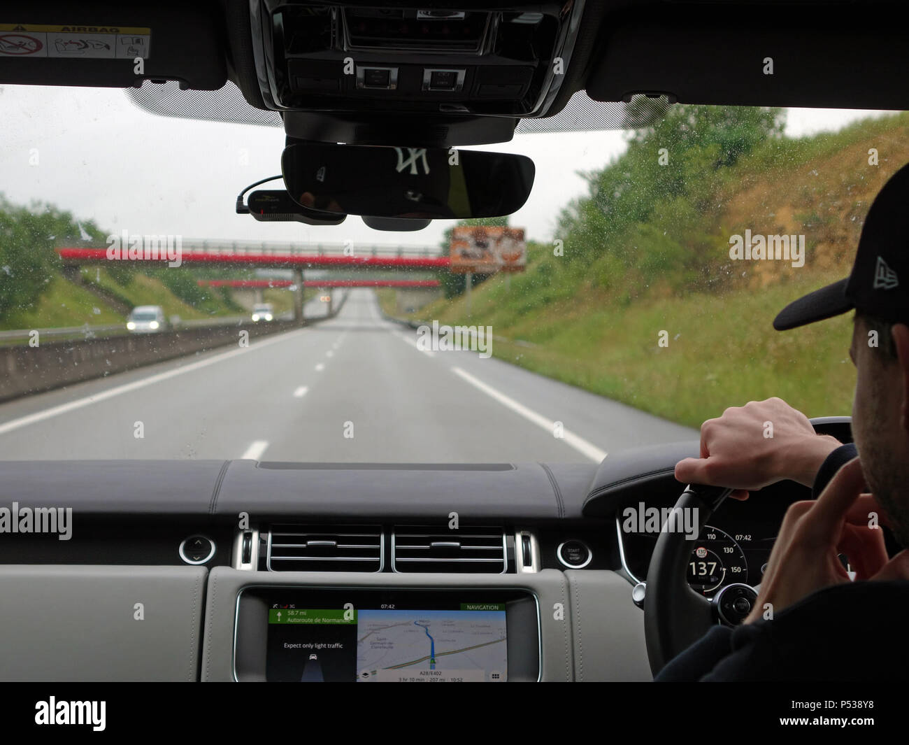 A guy driving in his Range Rover through France Stock Photo - Alamy