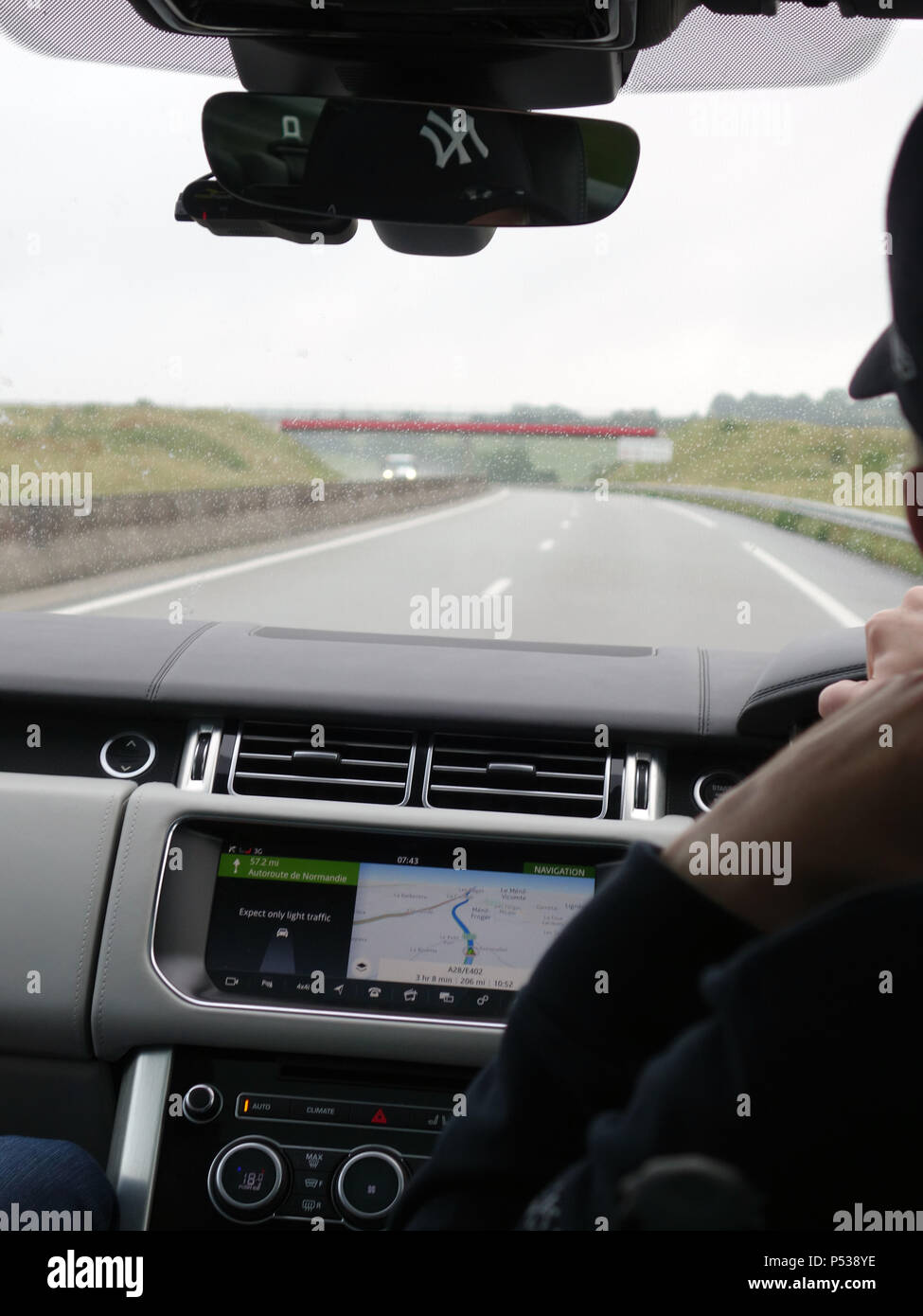 A guy driving in his Range Rover through France Stock Photo - Alamy