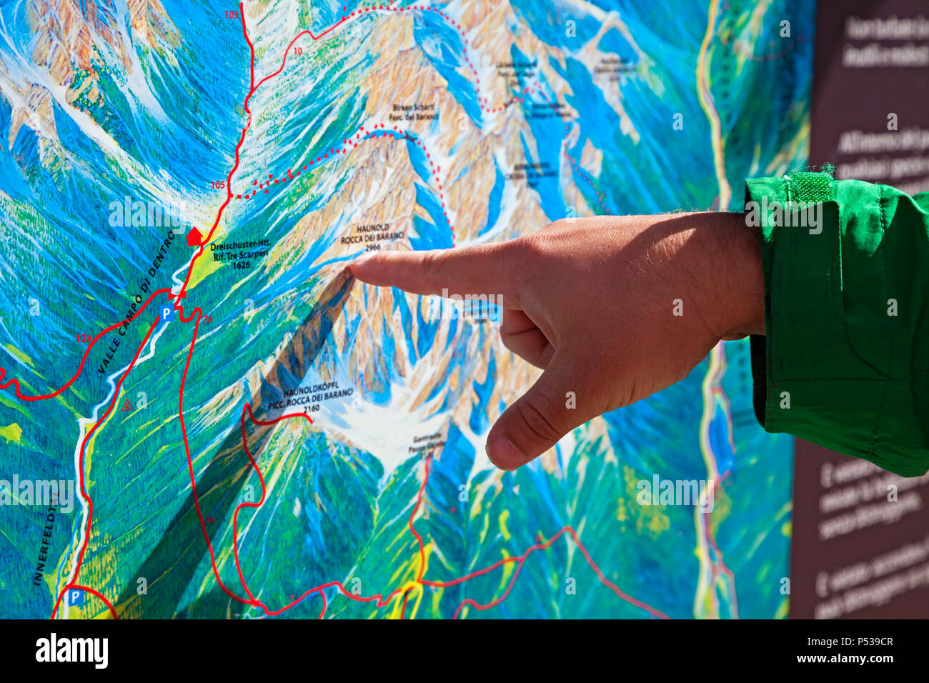 Finger pointing on map hi-res stock photography and images - Alamy