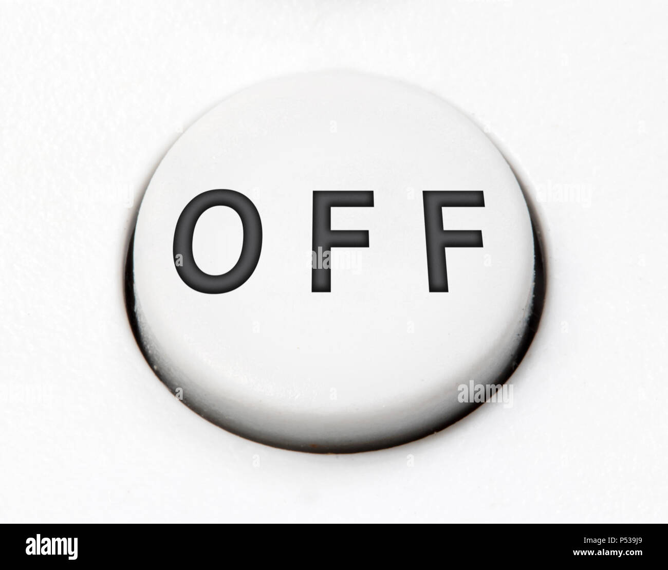 A white round button switch - off, close up. Control mechanical key for ...