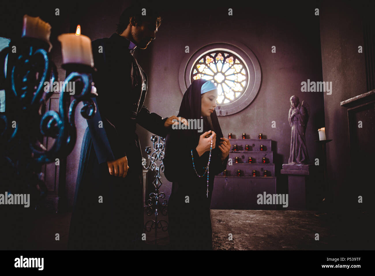 Praying Nun Holding Rosary High Resolution Stock Photography and Images ...