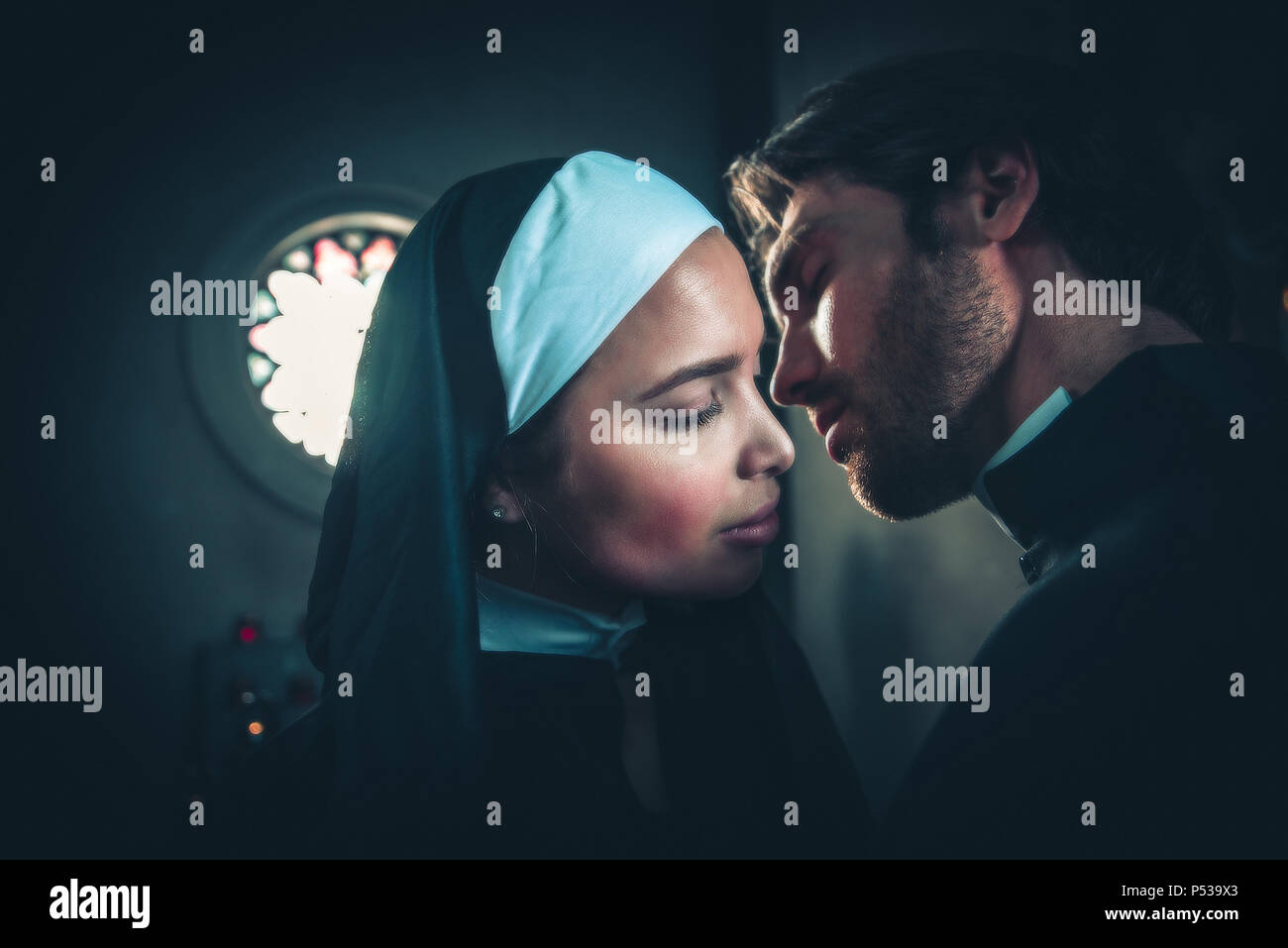 Praying nun holding rosary hi-res stock photography and images - Alamy