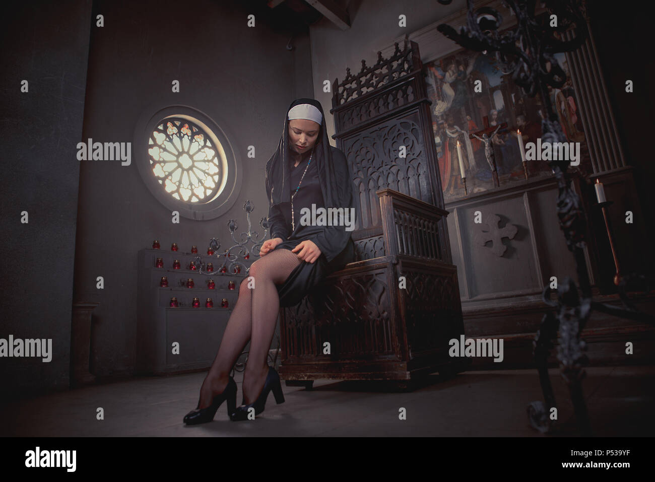 Nun praying in a monastery Stock Photo - Alamy