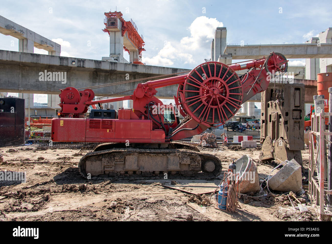 Construction machine on building site. The excavator works on the ...