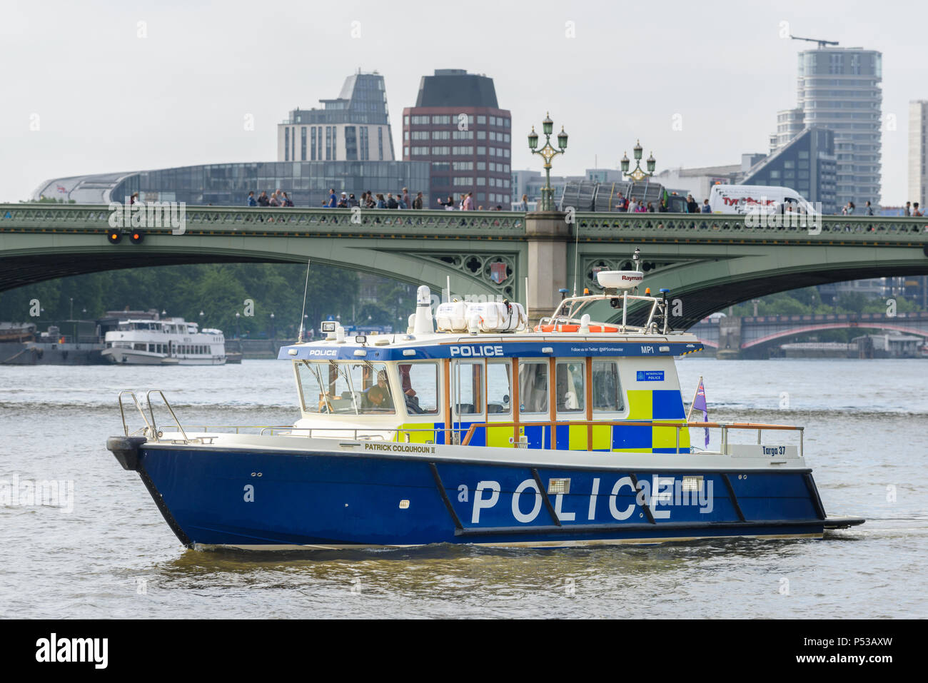 A metropolitan police launch at Westminster bridge, London, England ...