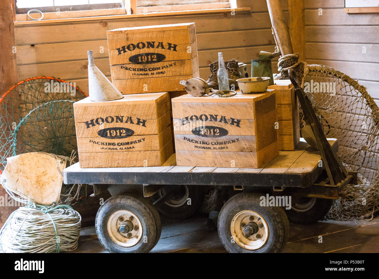 Cases on Antique Dolly in Old Warehouse Stock Photo - Alamy