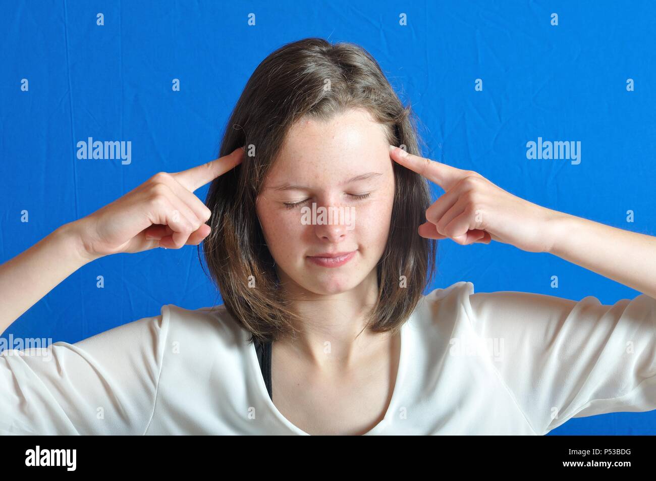 Portrait of teenage girl thinking Stock Photo - Alamy
