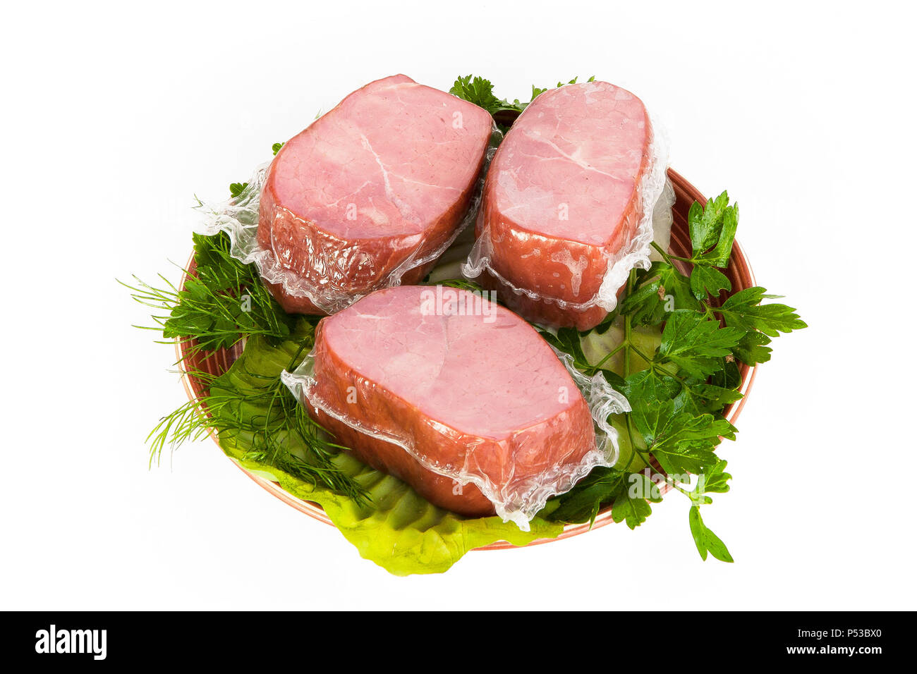 Smoked pork neck with greens laid on a platter Stock Photo - Alamy