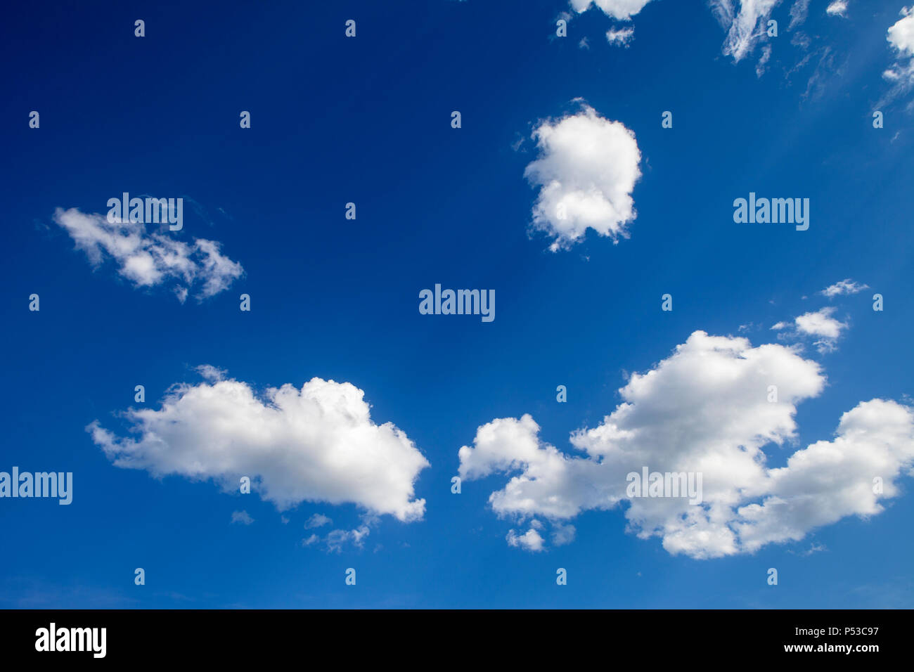 Blue sky background with clouds close-up Stock Photo - Alamy