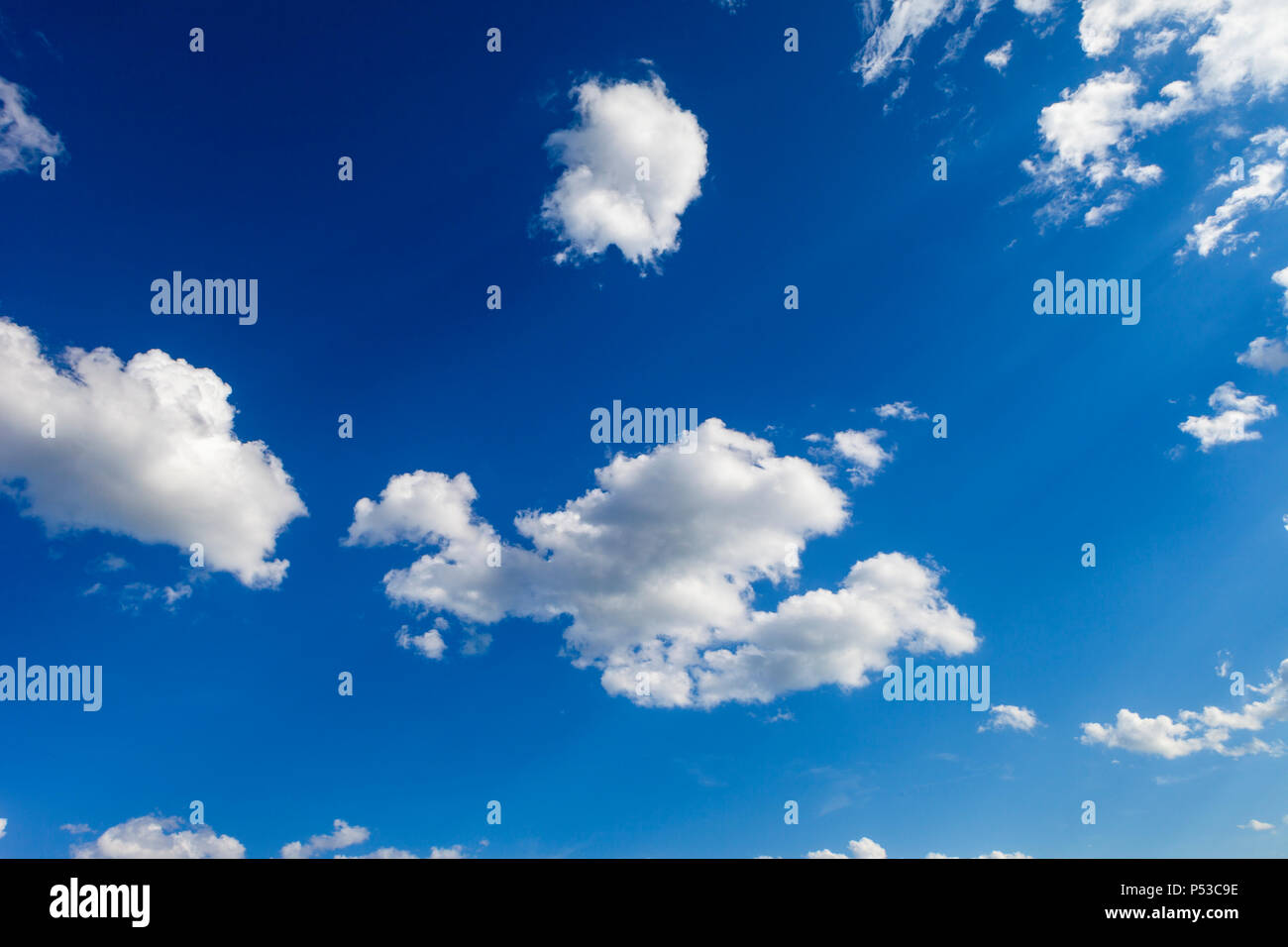 Blue sky background with clouds close-up Stock Photo - Alamy