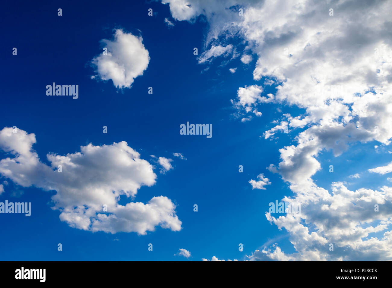 Blue sky background with clouds close-up Stock Photo - Alamy
