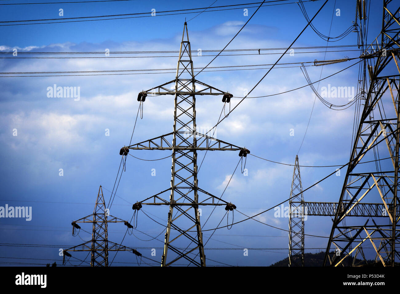 an image of a metal tower of Power Lines Stock Photo - Alamy