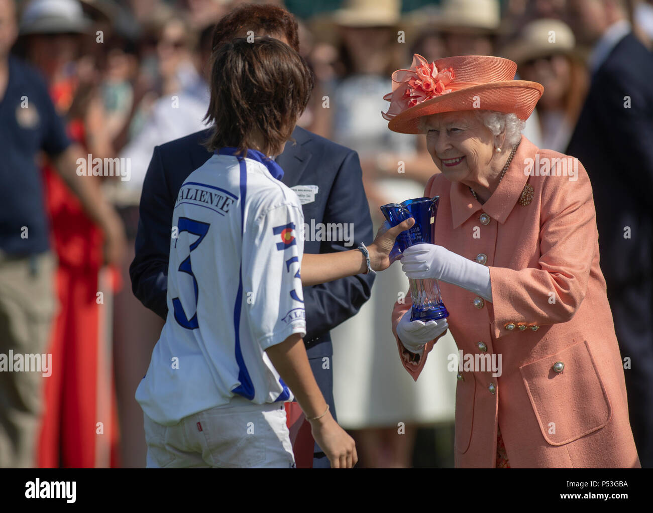 Queen Elizabeth II presents trophies to the winners of the Out-Sourcing ...
