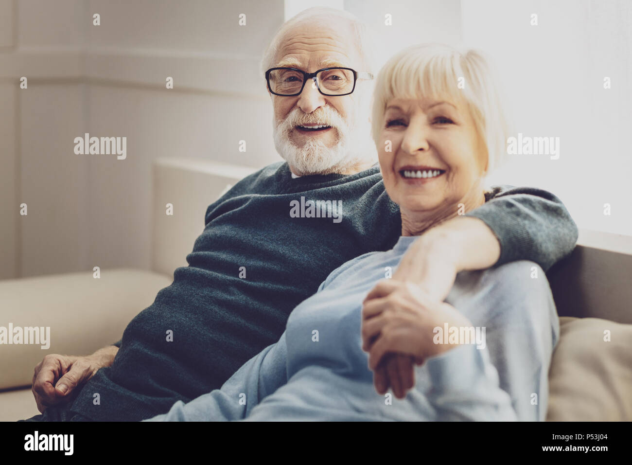Happy married couple resting Stock Photo - Alamy