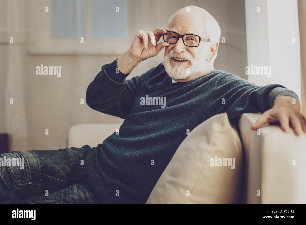 Cheerful joyful man smiling Stock Photo - Alamy