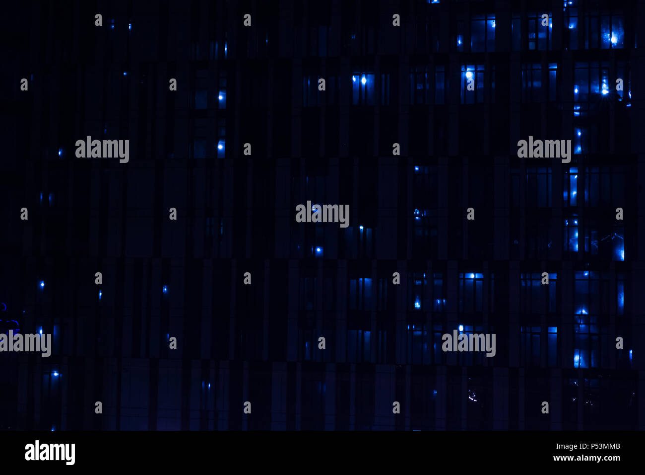 Illuminated windows office building night hi-res stock photography and ...